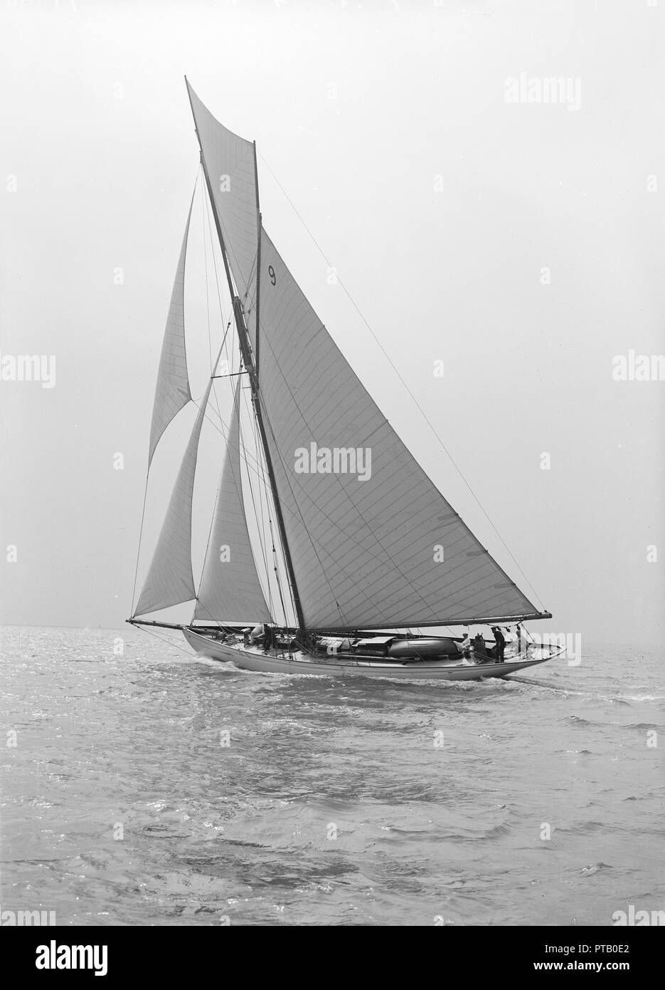 The cutter 'Westwind' sailing close-hauled, 1914. Creator: Kirk & Sons ...