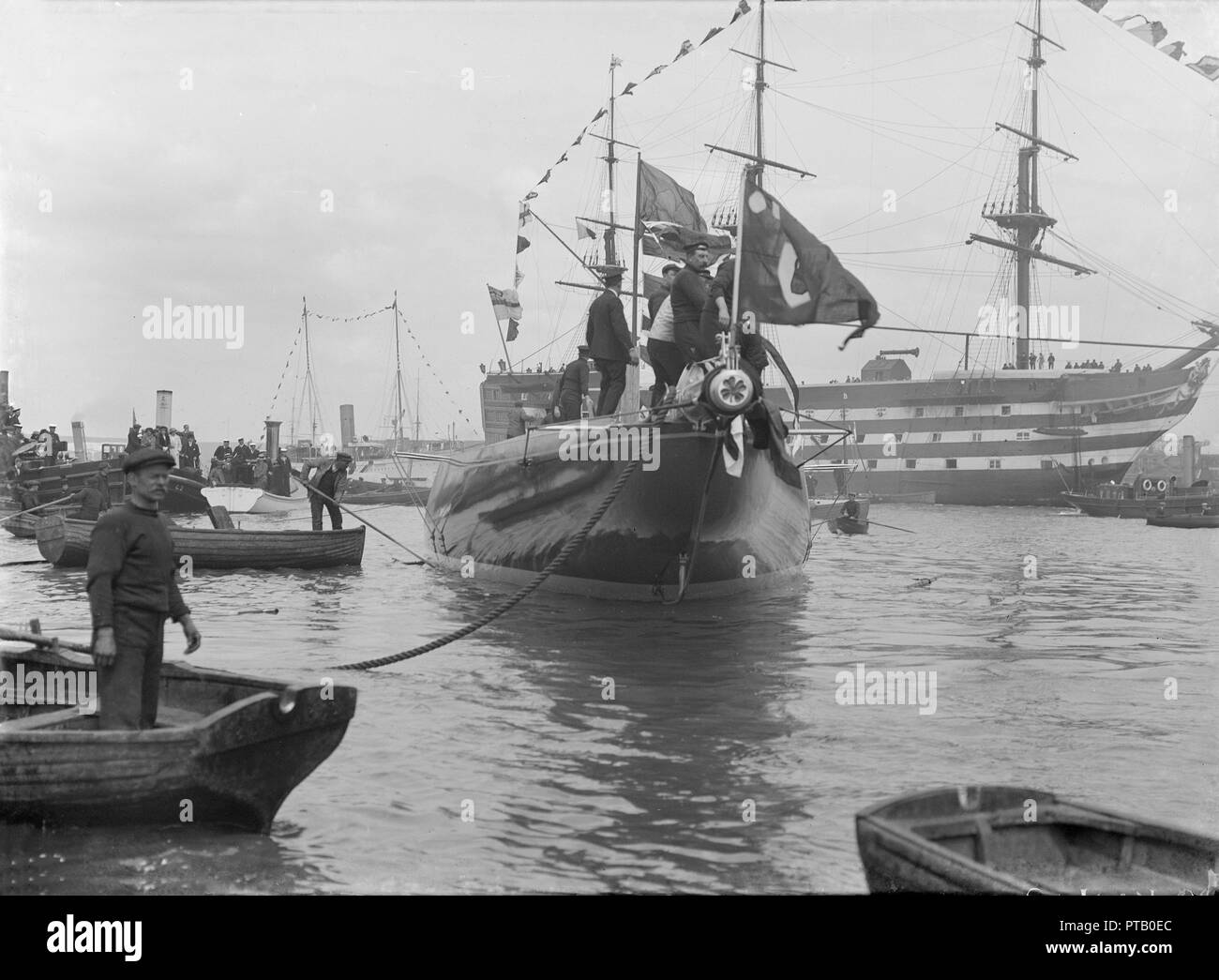 After launch of 'Shamrock IV' at Gosport with H.M.S. Victory in the ...
