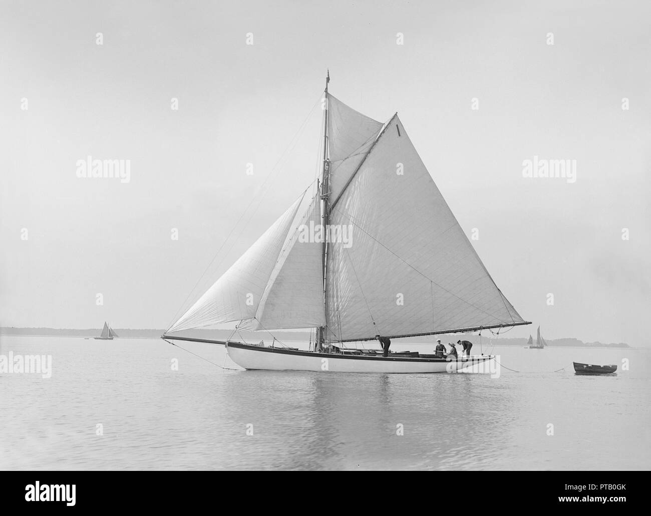 The cutter 'Wenda' in light winds, 1912. Creator: Kirk & Sons of Cowes ...