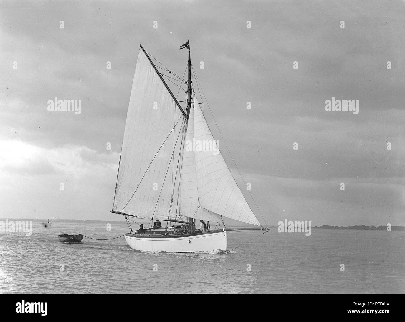 The gaff rig sailboat 'Bunty' close-hauled, 1921. Creator: Kirk & Sons ...