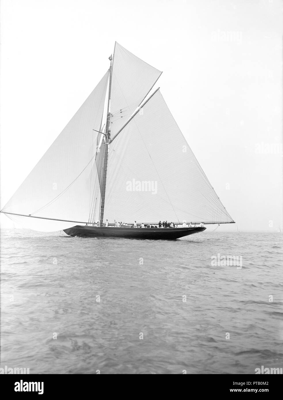The 221 ton gaff-rigged cutter 'Britannia' sailing under spinnaker ...