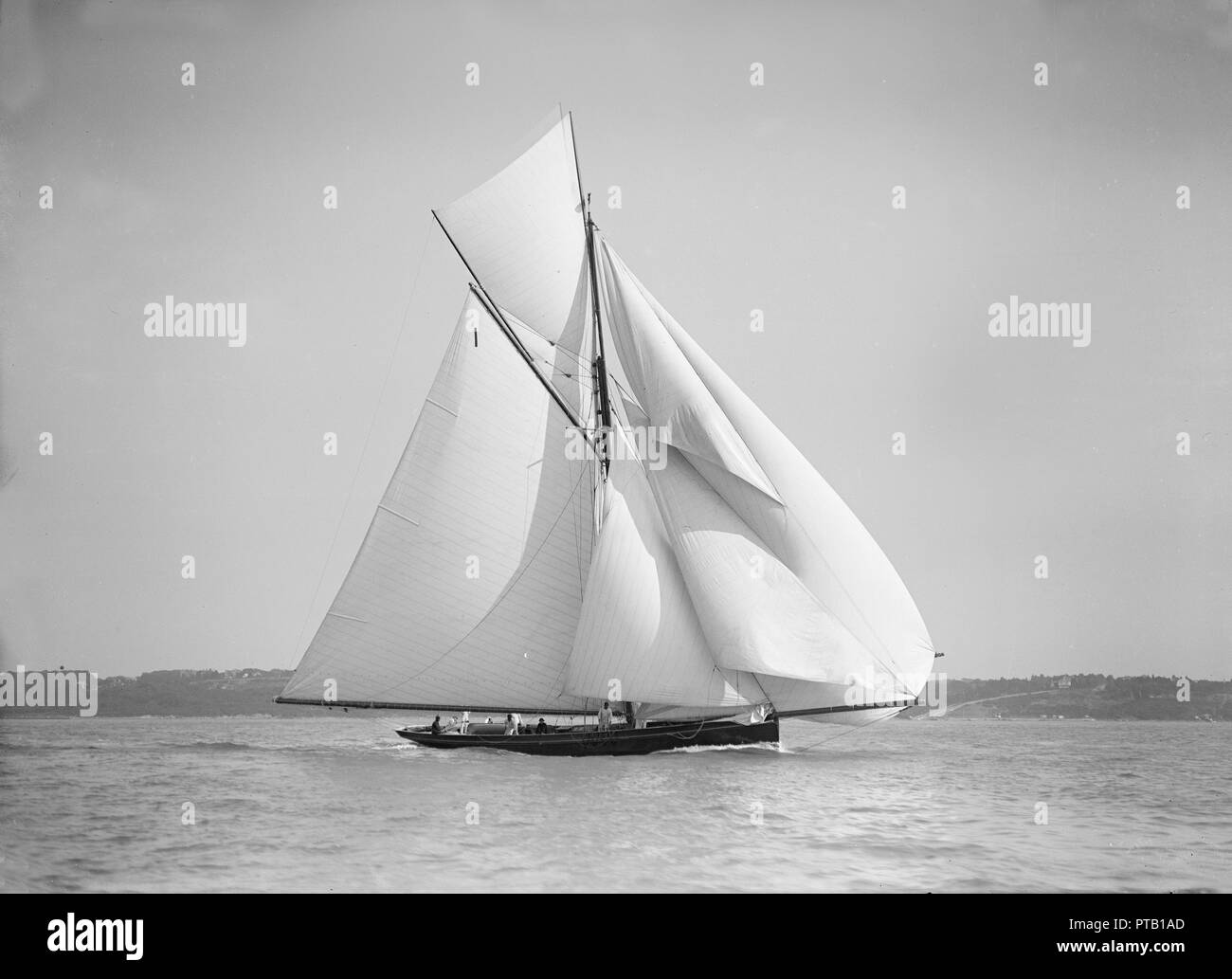 The gaff rigged cutter 'Bloodhound' sailing downwind with spinnaker ...