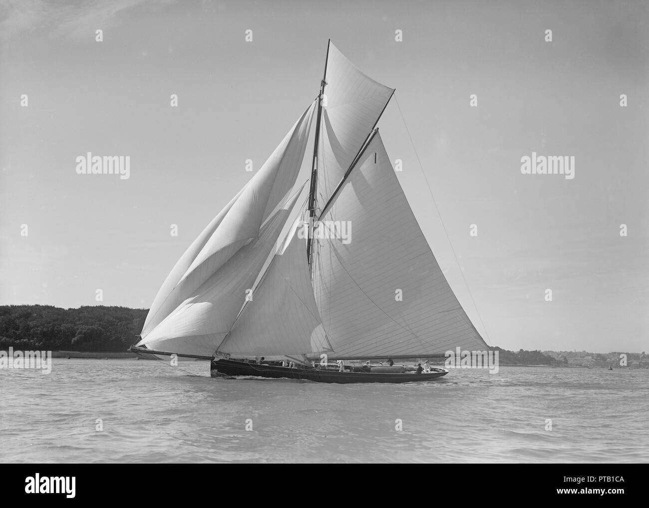 The gaff rigged cutter 'Bloodhound' sailing downwind under spinnaker ...