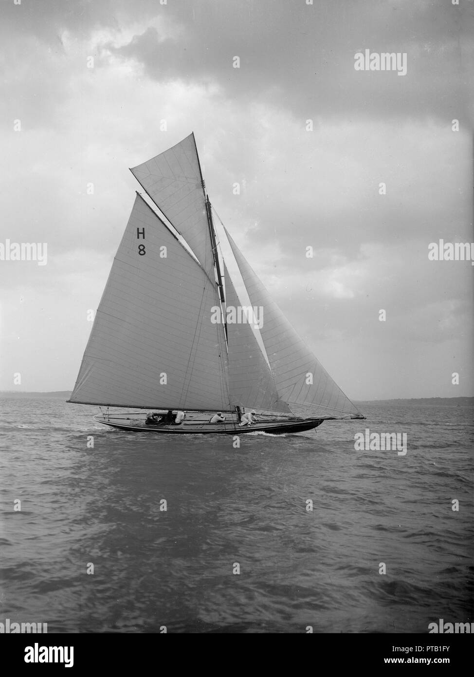 The 8 Metre 'Spero' (H8) sailing upwind, 1912. Creator: Kirk & Sons of ...