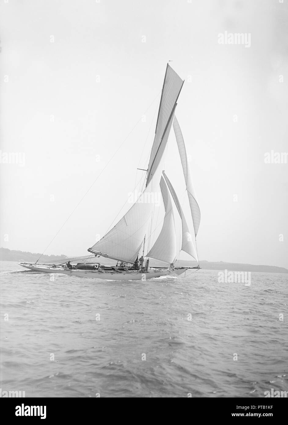 The 40-rater cutter 'Carina' sailing on a reach, 1911. Creator: Kirk ...