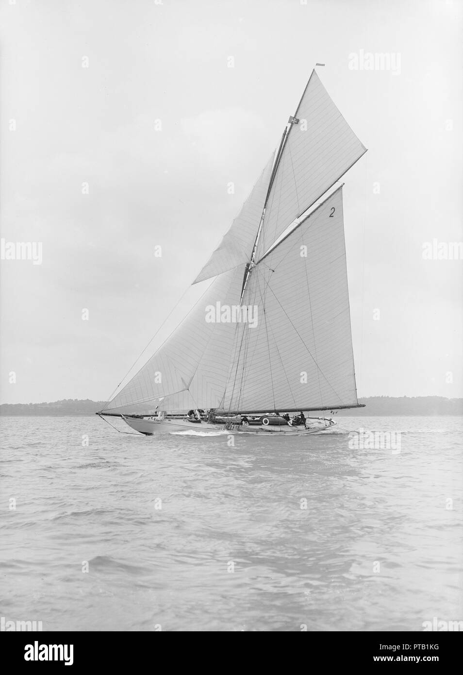 The 40-rater cutter 'Carina' sailing close-hauled, 1913. Creator: Kirk ...