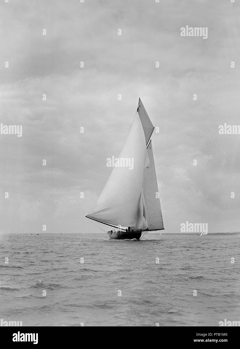 The cutter racing yacht 'Terpsichore' running downwind, 1922. Creator ...