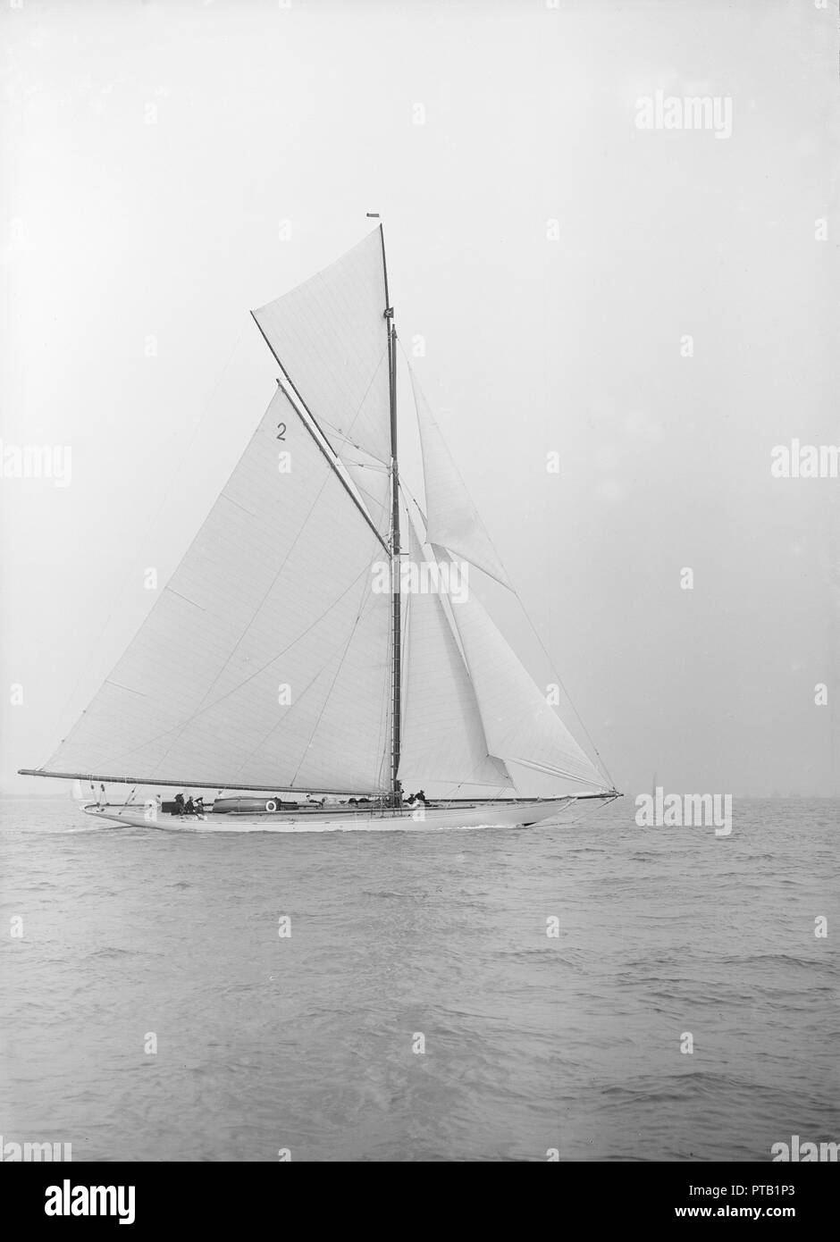 The 40-rater cutter 'Carina' sailing close-hauled, 1913. Creator: Kirk ...