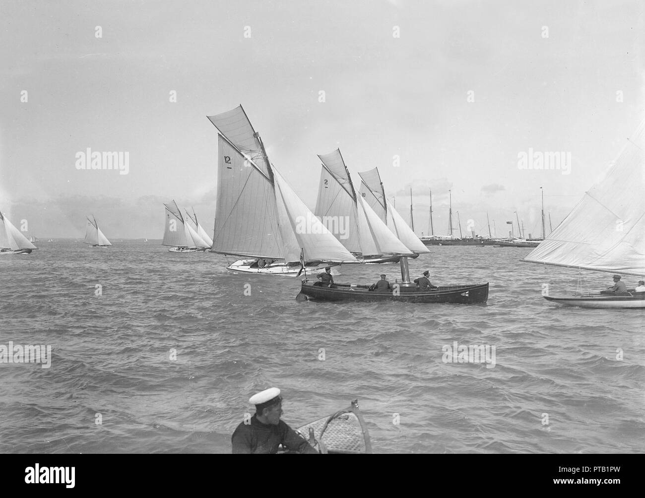 Sailing yachts cross start line. Creator: Kirk & Sons of Cowes Stock ...