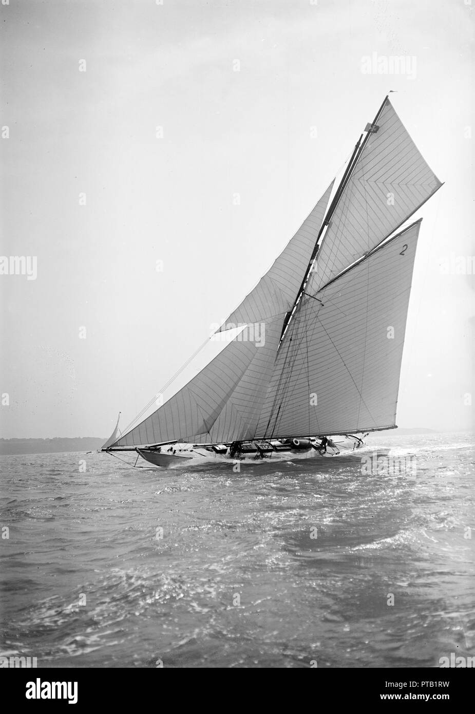 The 40-rater cutter 'Carina' sailing close-hauled, 1911. Creator: Kirk ...