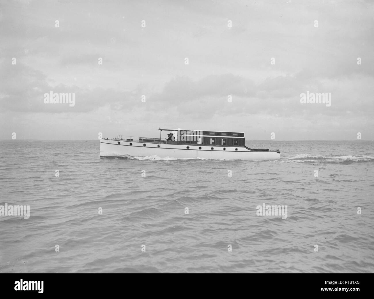 Cabin cruiser D.G.S.P., 1913. Creator: Kirk & Sons of Cowes Stock Photo ...