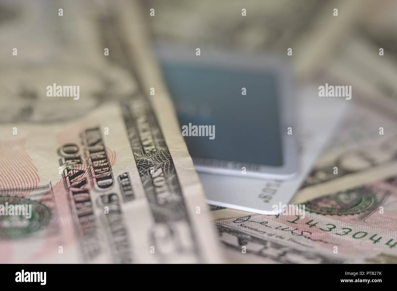 Dollar bills and credit cards Stock Photo - Alamy