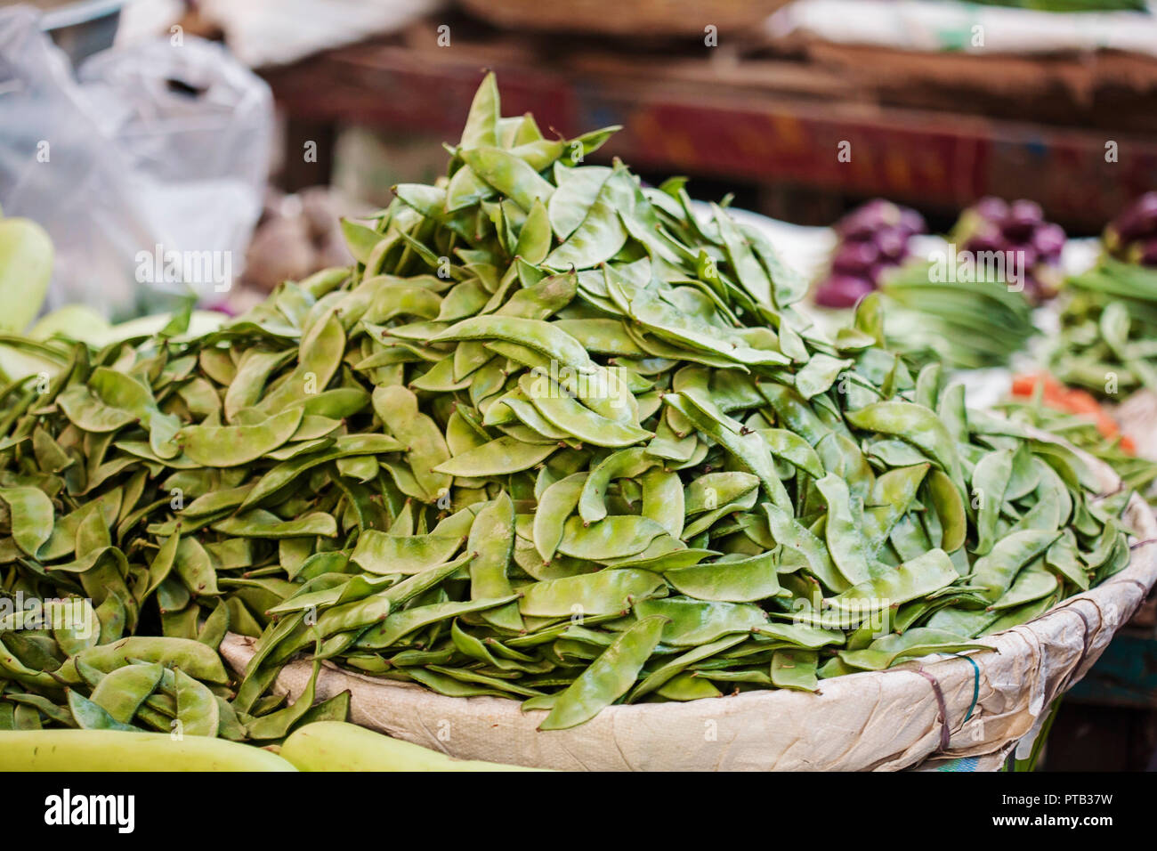 Green pods at Indian local market Stock Photo - Alamy