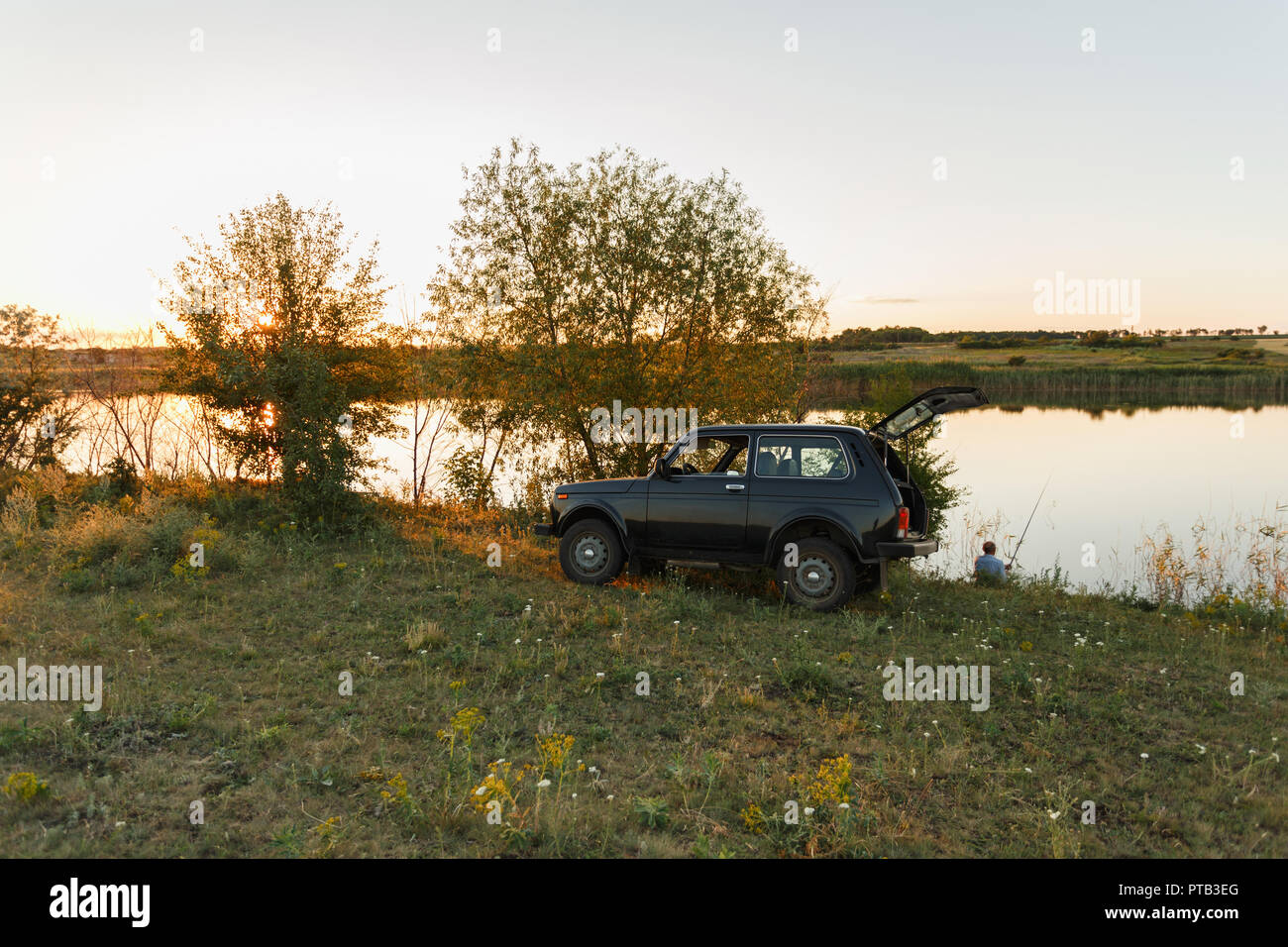 DNIPROPETROVSK REGION, UKRAINE - JUNE 19, 2017: Vaz Niva blue-green ...