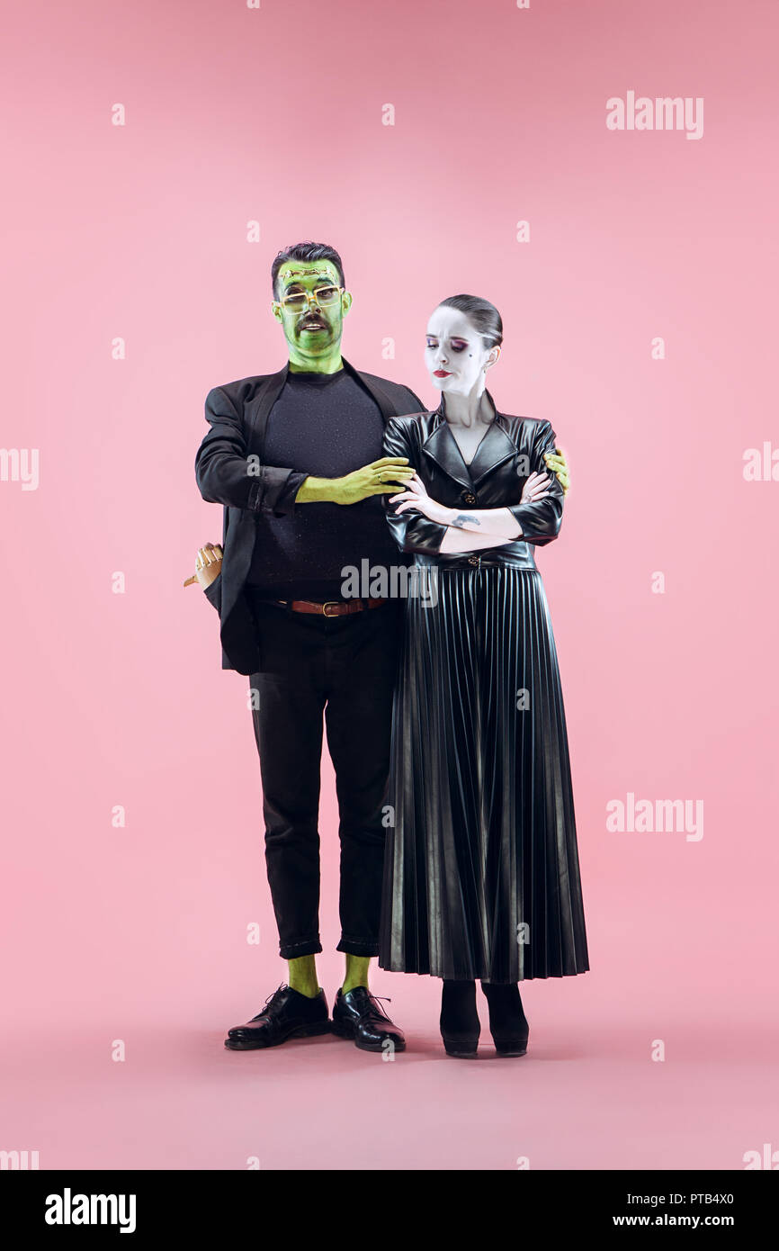 Halloween Family. Happy couple in Halloween Costume and Makeup. Bloody ...