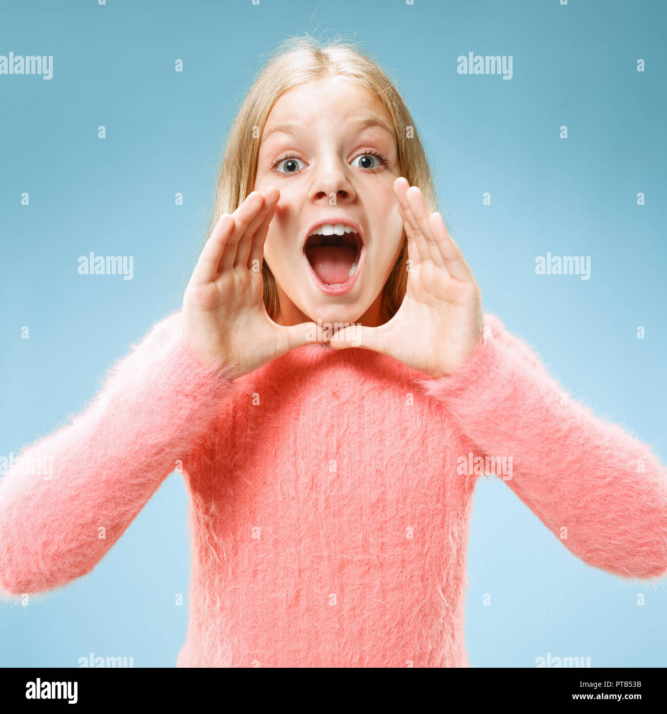 Do not miss. Young casual teen girl shouting. Shout. Crying emotional ...