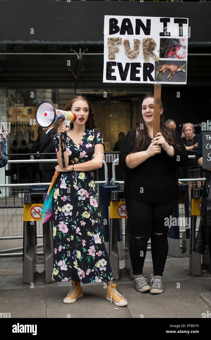 LONDON, UK- SEPTEMBER 14 2018: Beautiful girl in a long fashionable ...