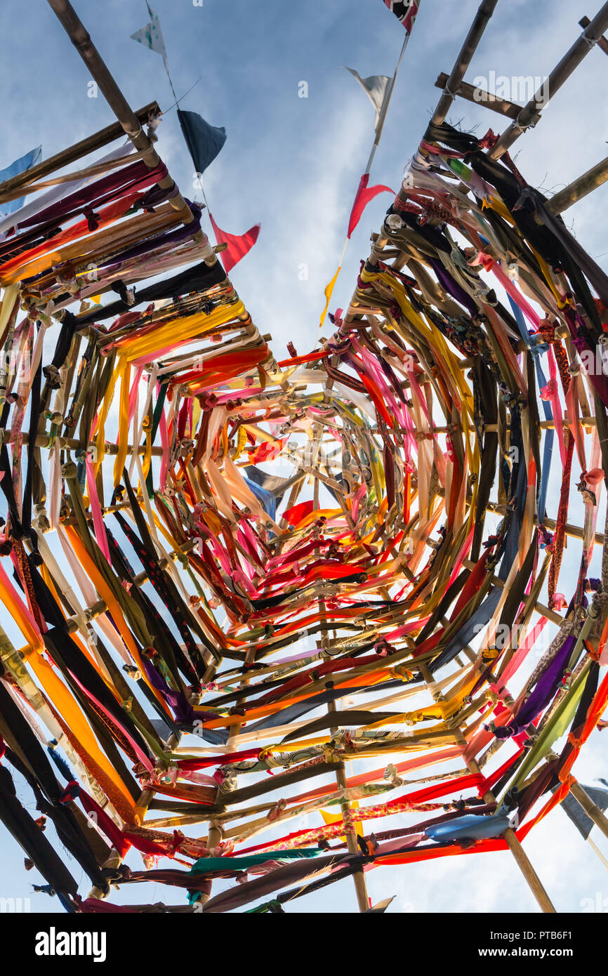 Close up of a circle-shaped multicolor cloth pin wheel with blurred ...