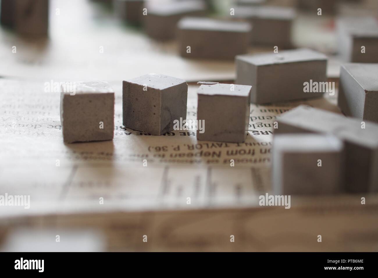 Plaster blocks drying on newspaper. These will be used to build a ...