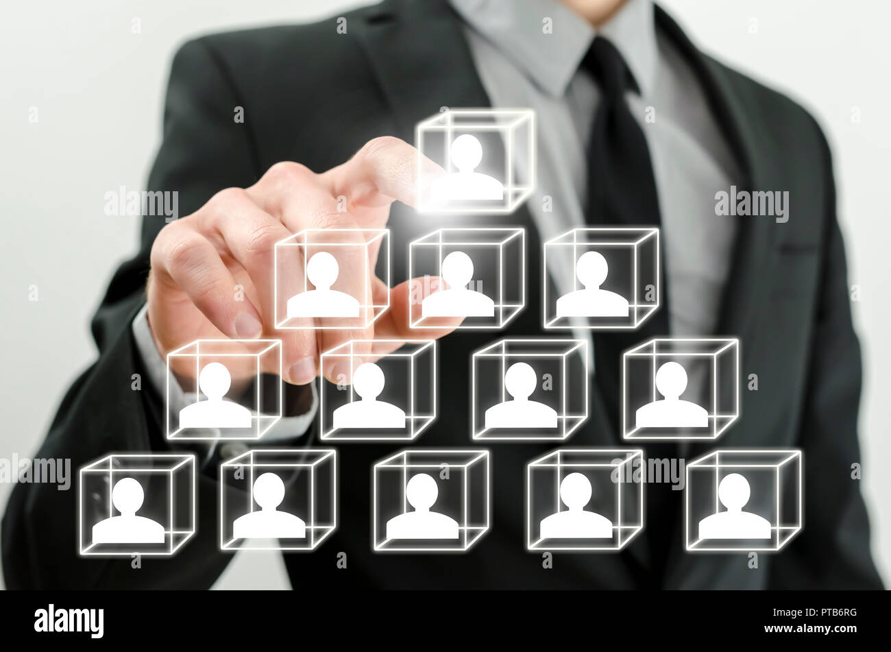 Closeup of boss arranging business hierarchy on virtual screen Stock ...