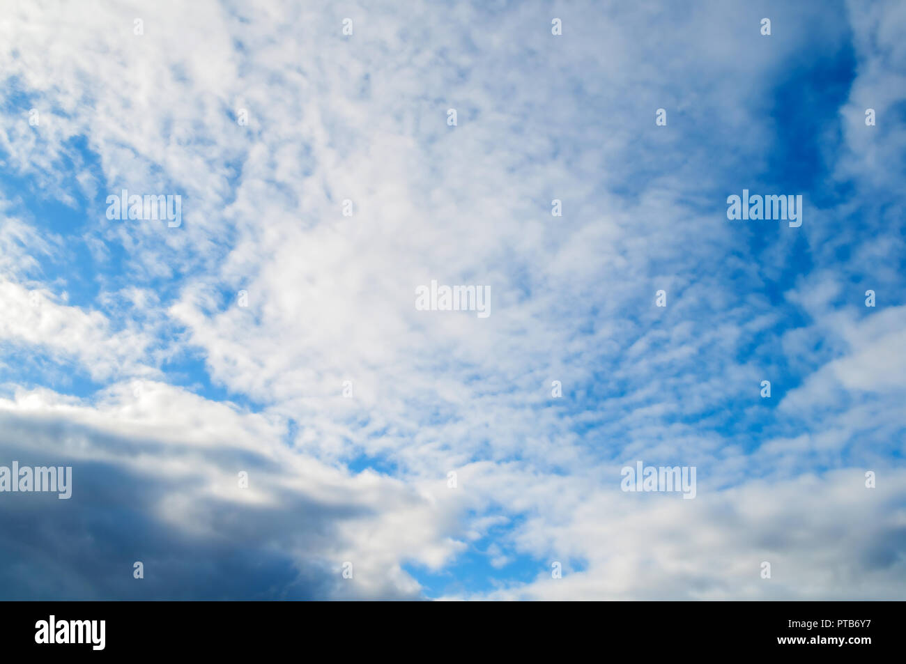 Blue sky landscape scene - white dramatic fluffy colorful clouds and ...