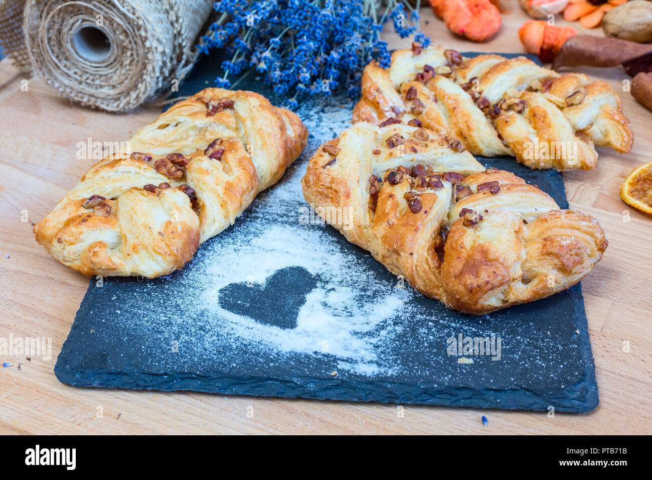marple and pecan plait pastry sweet food breakfast with heart sign and ...