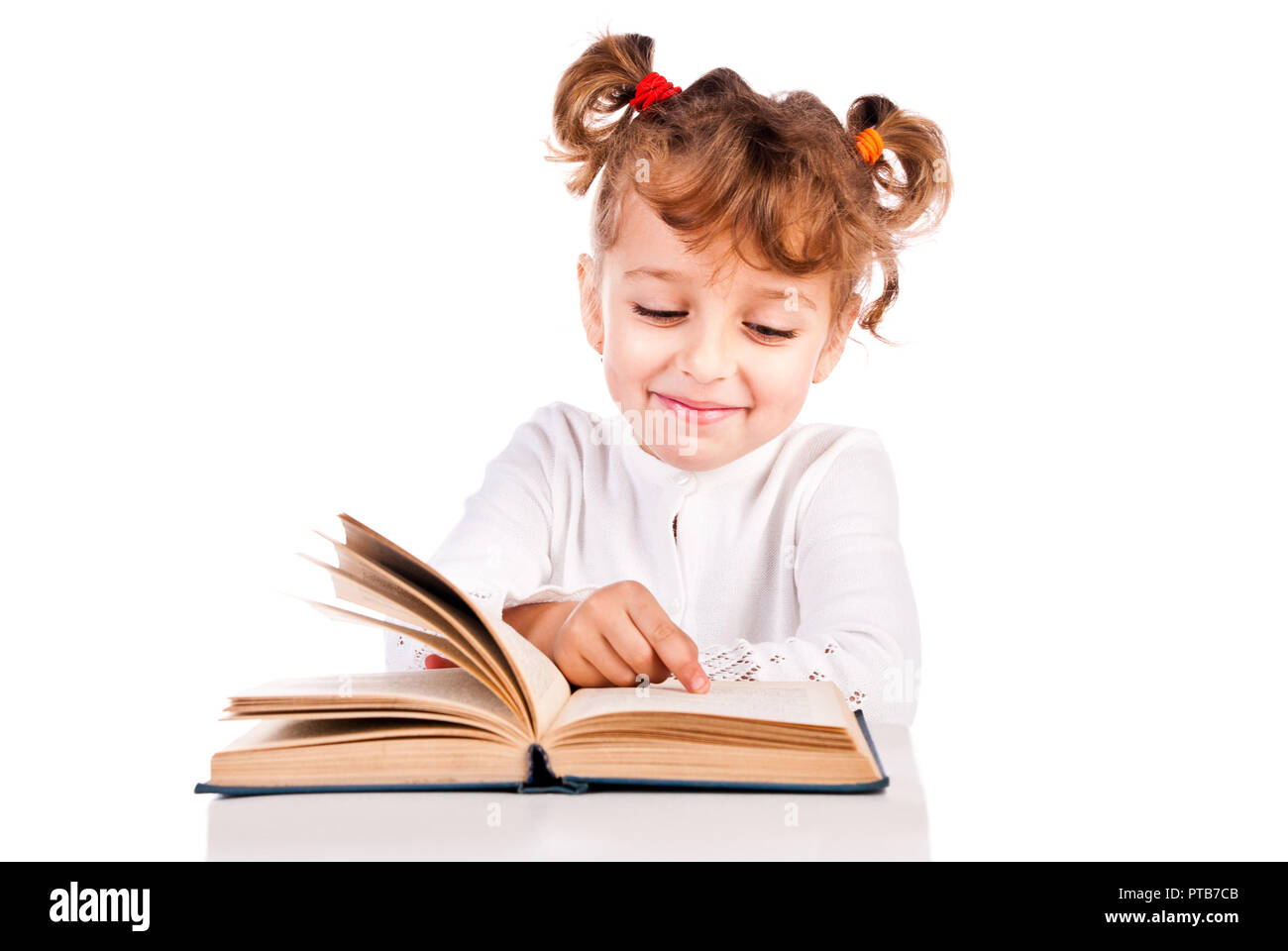 girl reading book isolated on a white background Stock Photo - Alamy