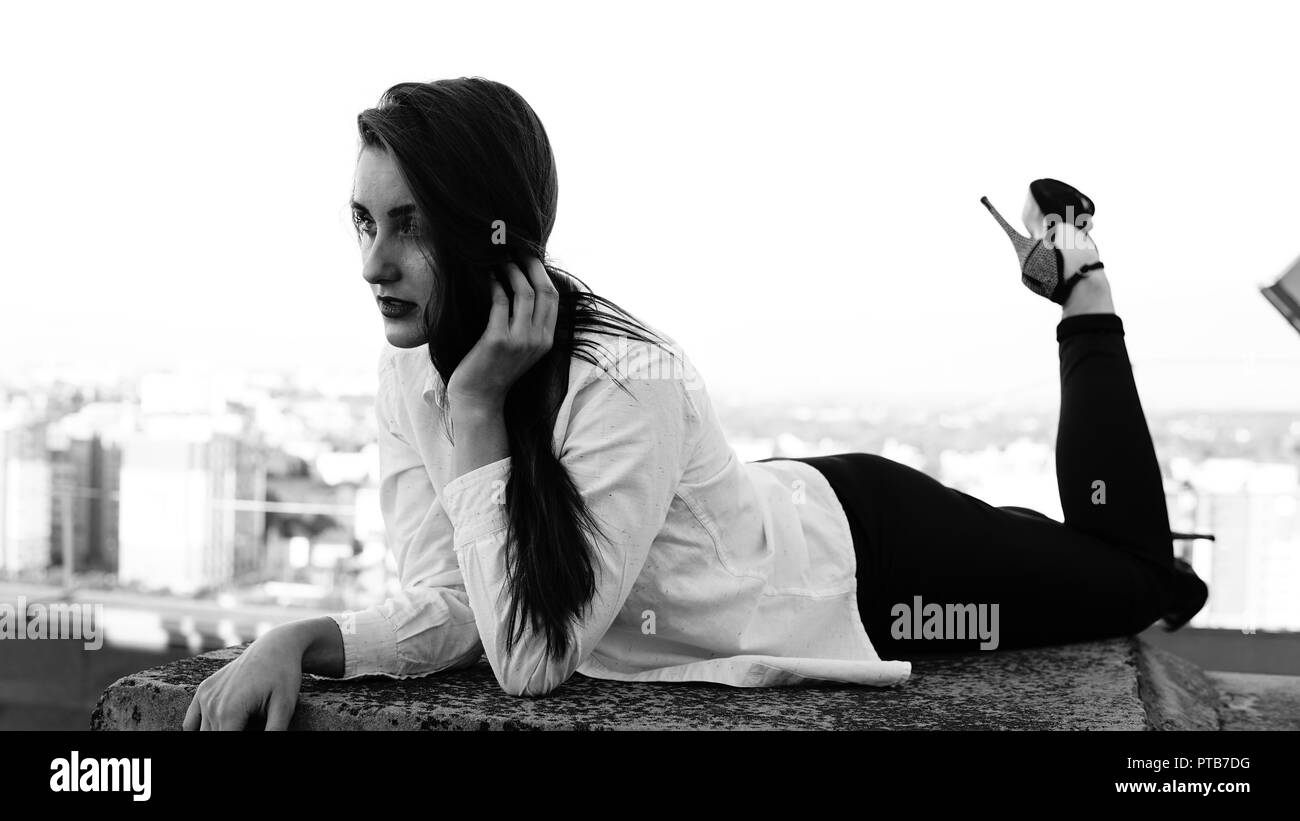 girl poses the roof Stock Photo - Alamy