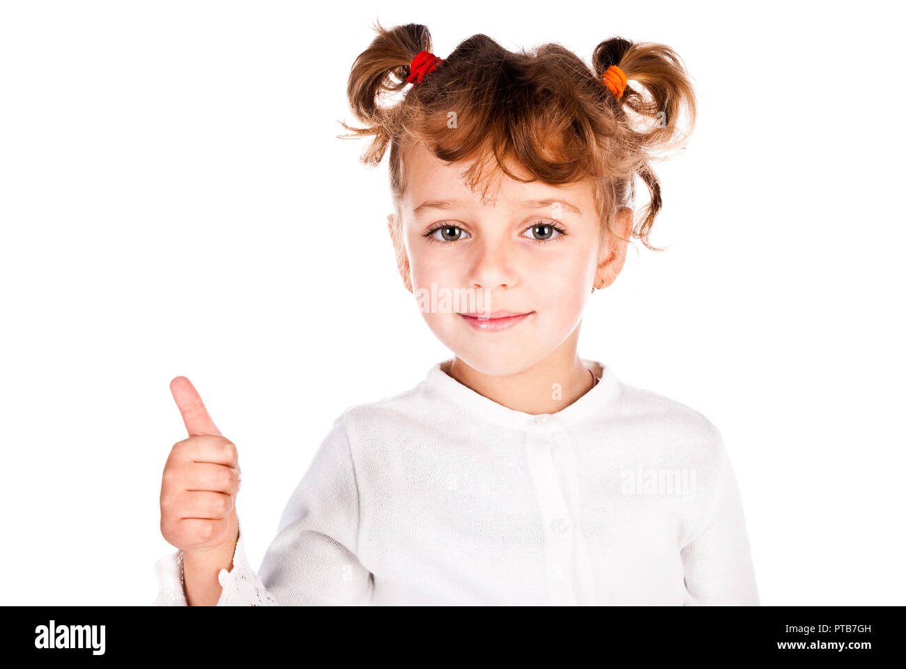 little girl giving thumb up Stock Photo - Alamy
