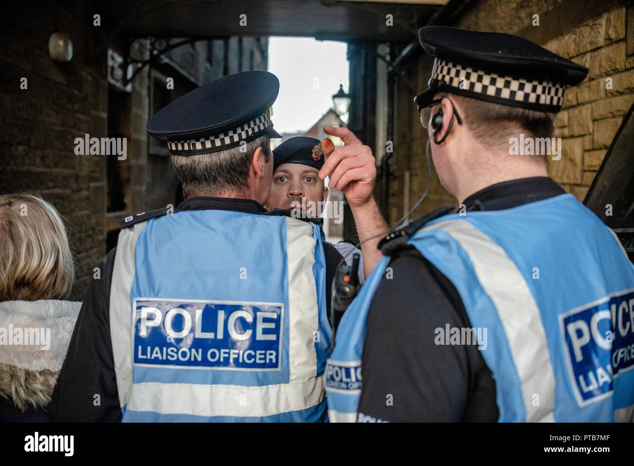 A member of the Pro-Union side is seen making threats to photographers ...