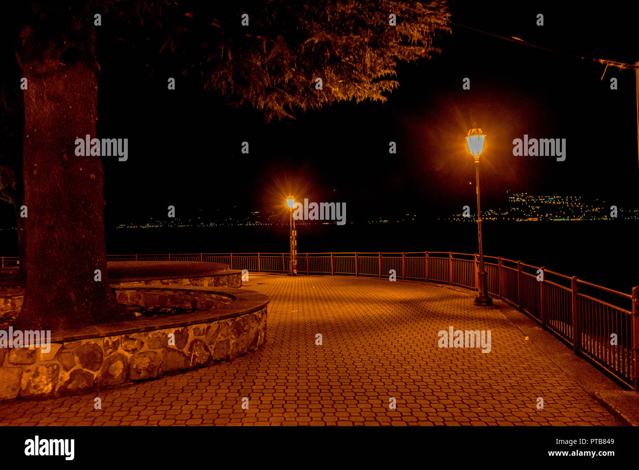 Europe, Italy, Lecco, Lake Como, a lit up bridge at night Stock Photo ...