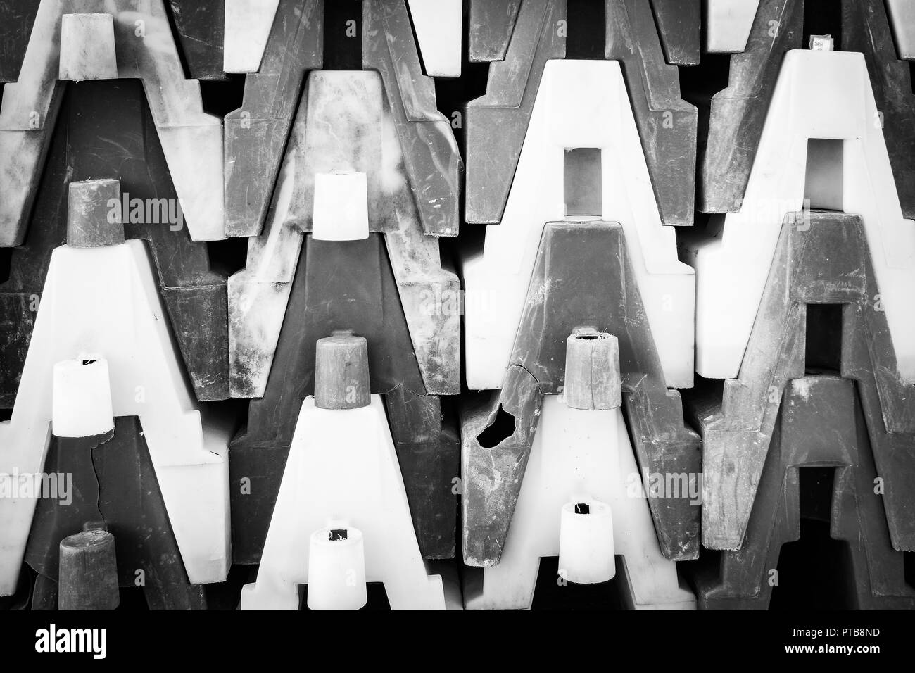 Plastic Barriers Stacked Neatly Stock Photo - Alamy