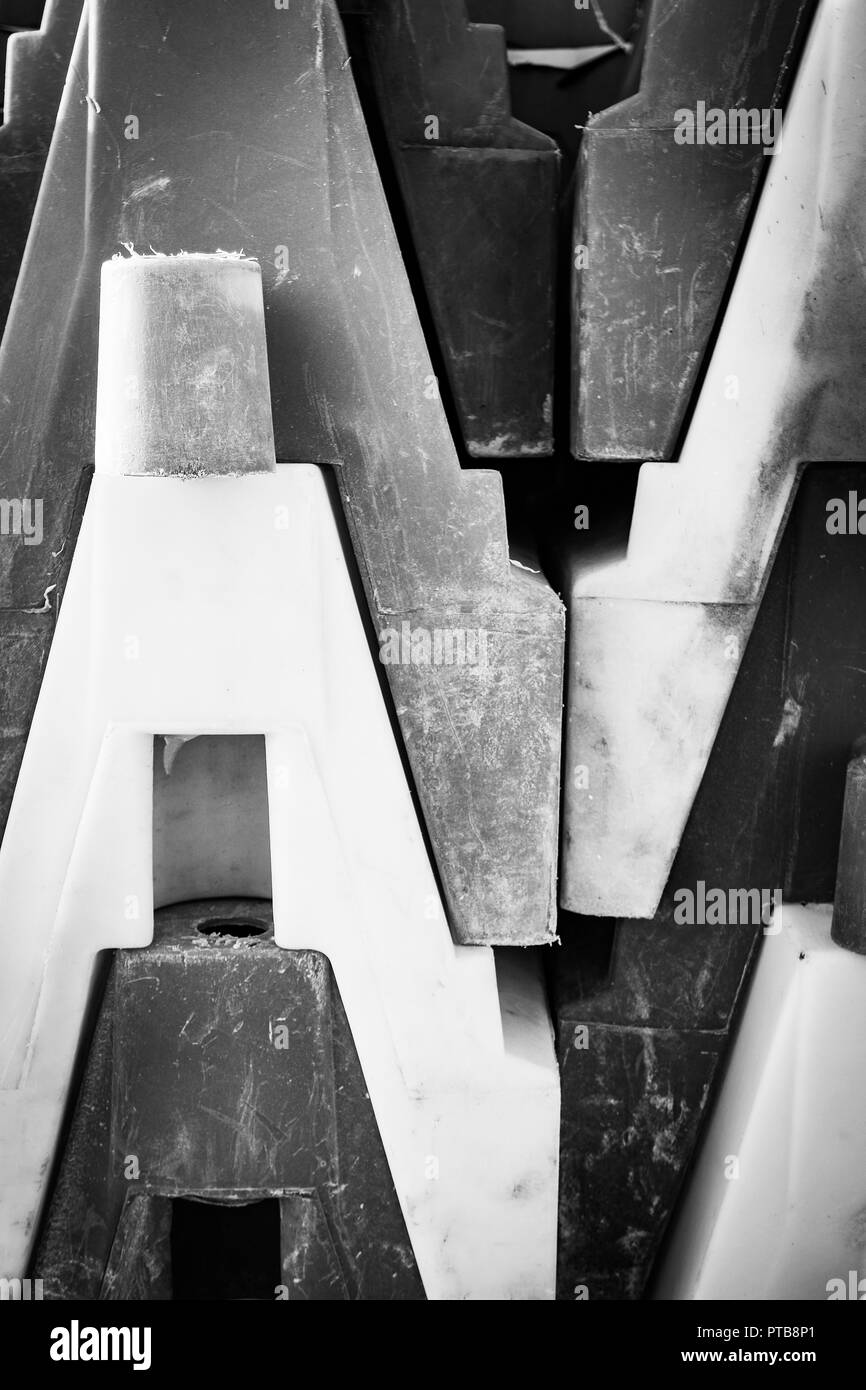 Plastic Barriers Stacked Neatly Stock Photo - Alamy