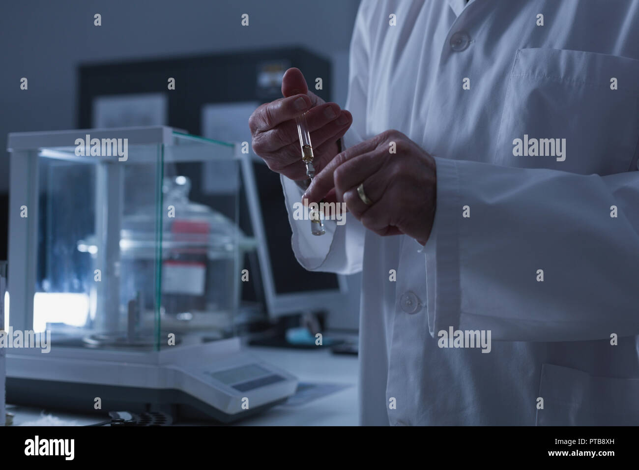 Sitting holding expertise science research laboratory hi-res stock ...