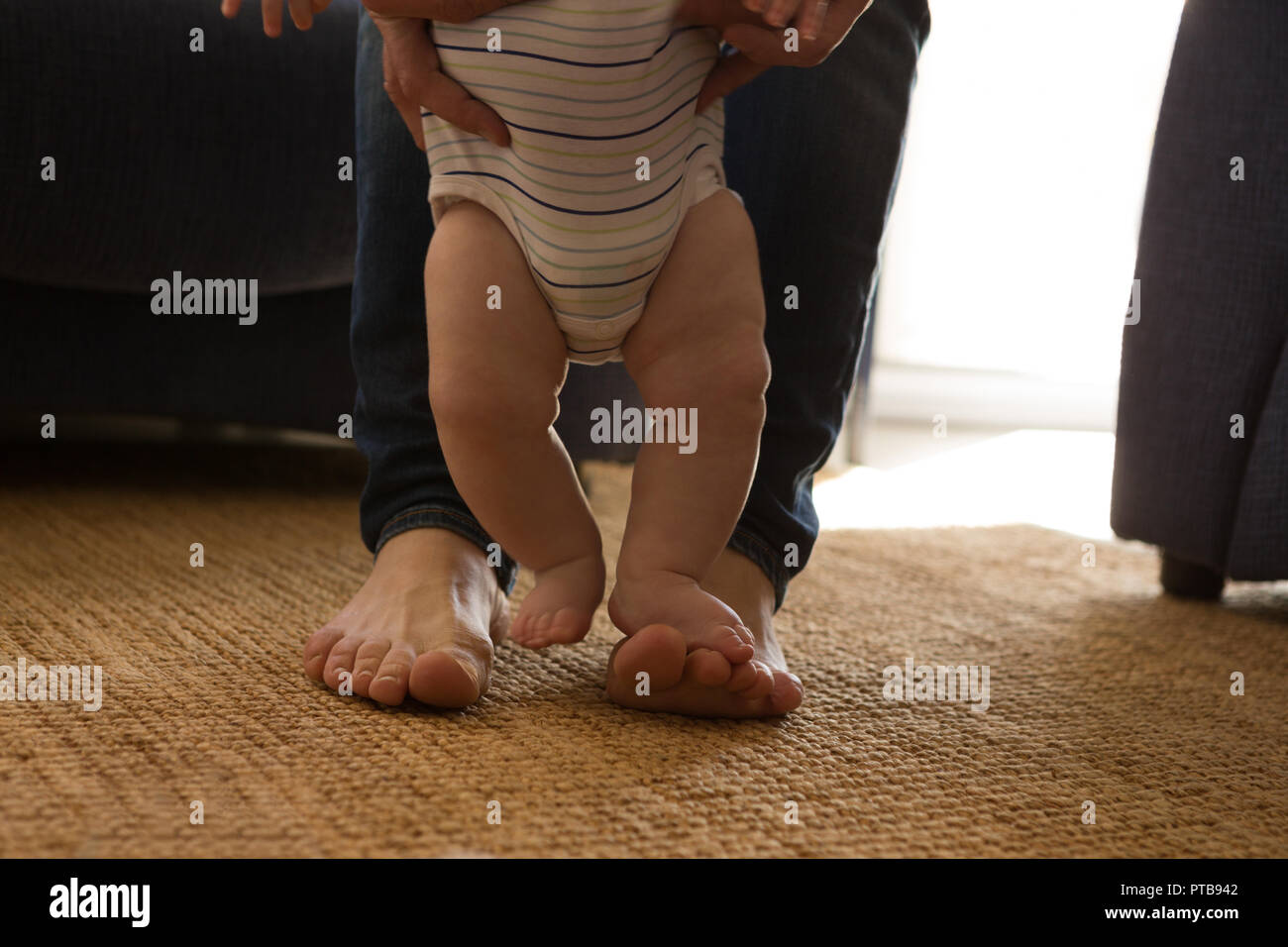 Man helping boy hi-res stock photography and images - Alamy
