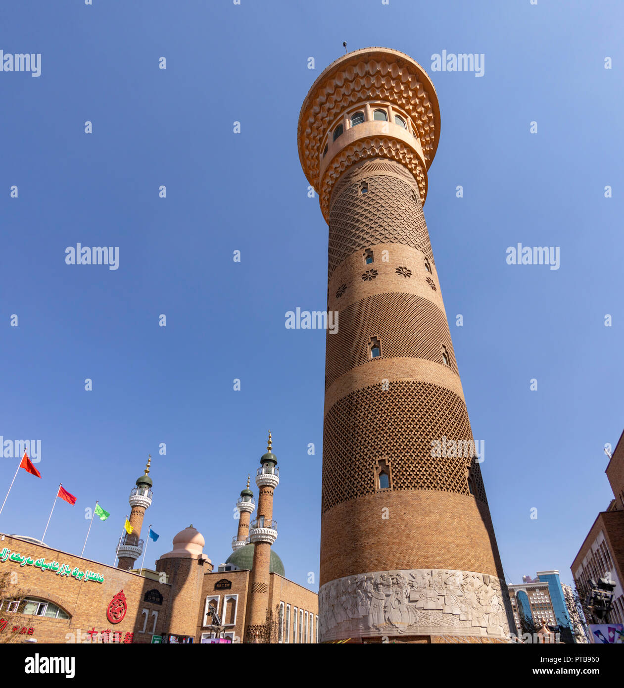 Panorama of tower and mosque against blue skies in square of Grand ...