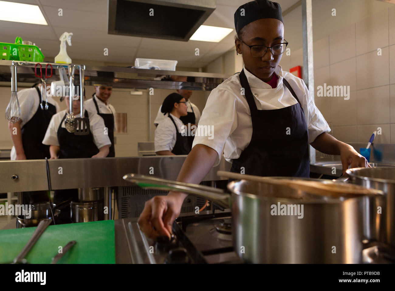 Asian female chef kitchen hi-res stock photography and images - Alamy