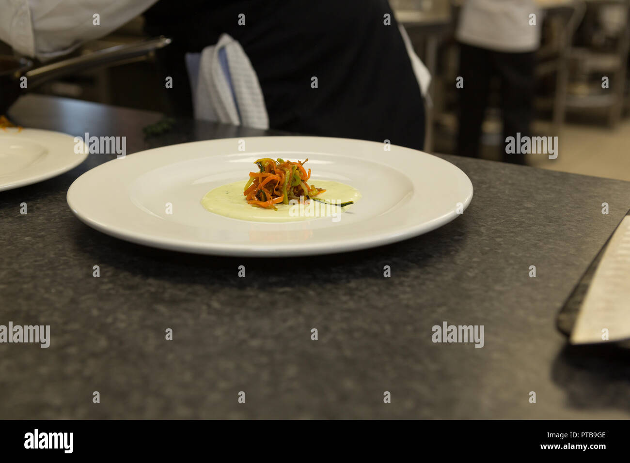 Food with sauce on a plate Stock Photo - Alamy