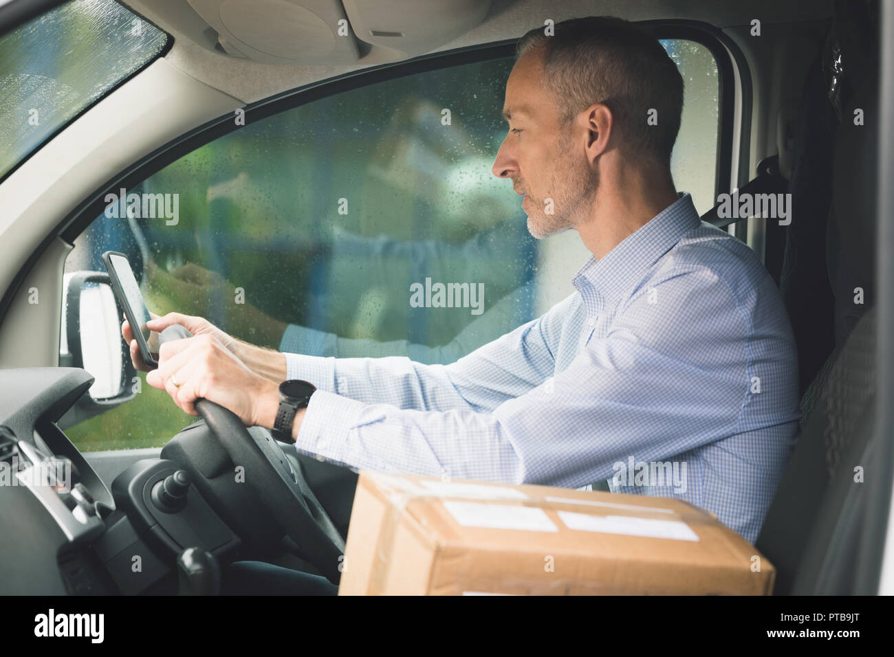 Driving delivery van hi-res stock photography and images - Alamy