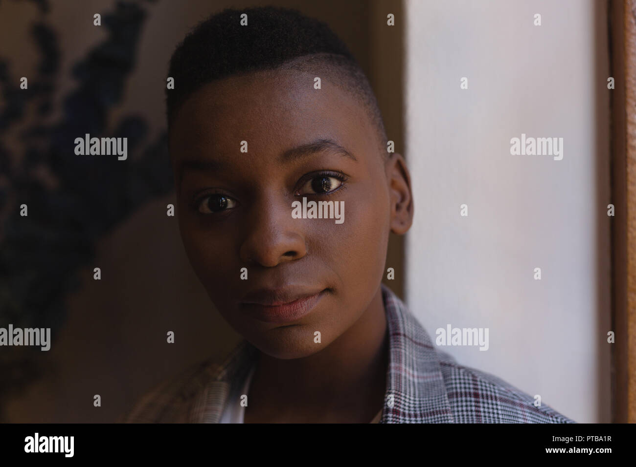 Female executive standing in office Stock Photo - Alamy