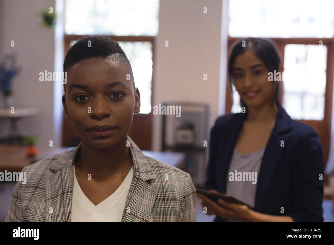 Business colleagues standing together hi-res stock photography and ...