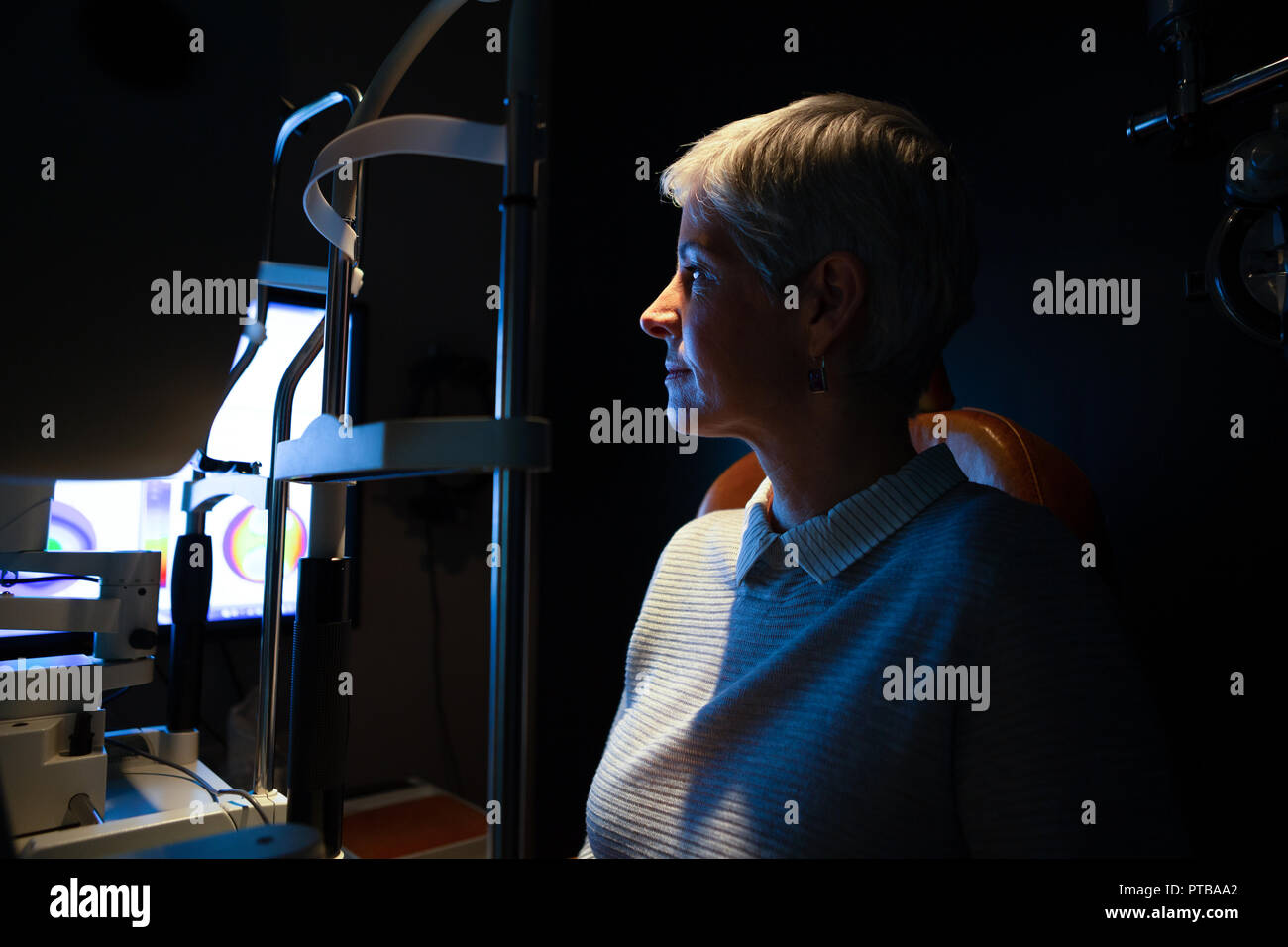 Patient looking at digital screen Stock Photo - Alamy
