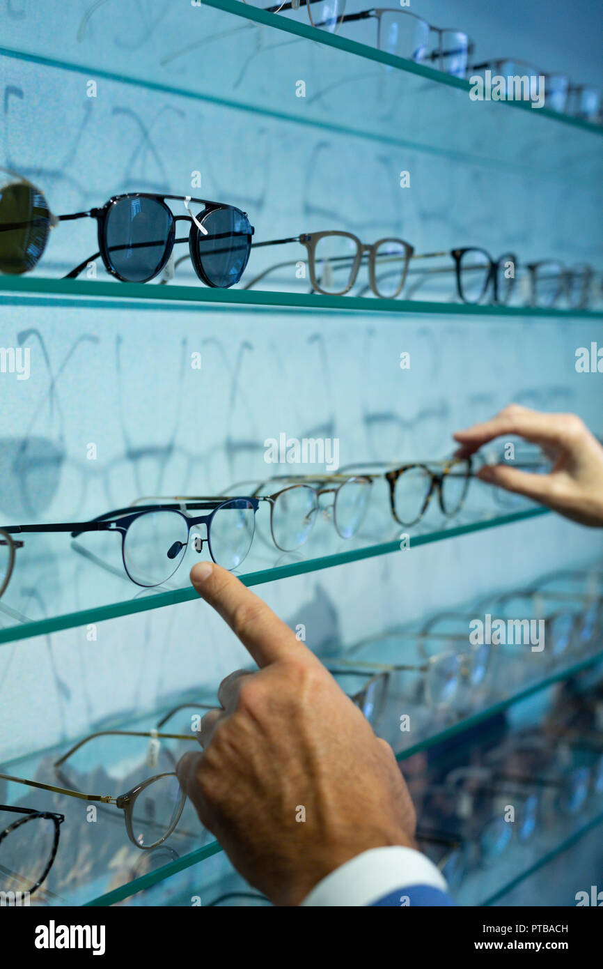 Selecting eyeglasses hi-res stock photography and images - Alamy