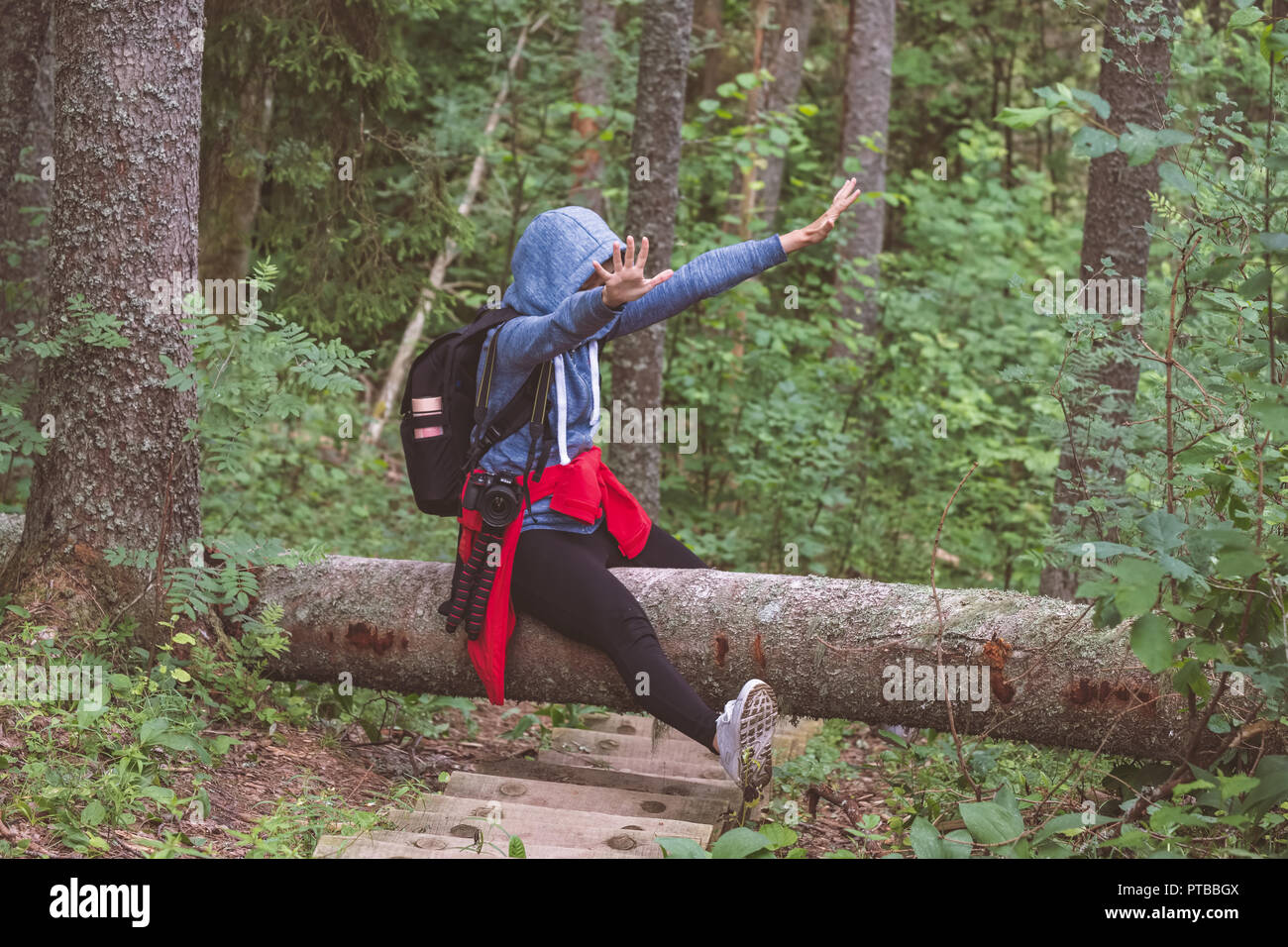 young woman enjoying nature trails in forest. vintage look - vintage ...