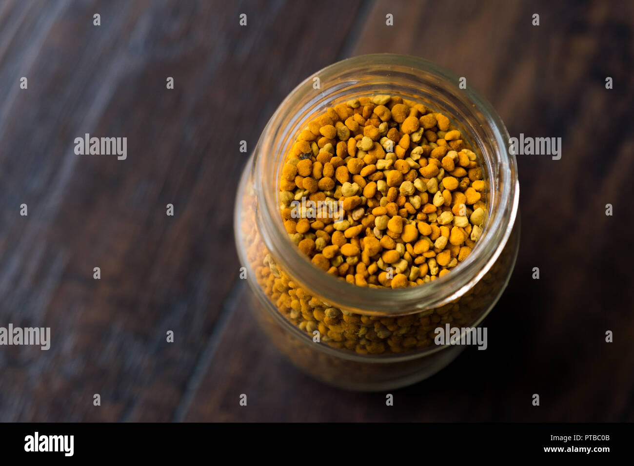 Yellow bee pollen in glass hi-res stock photography and images - Alamy