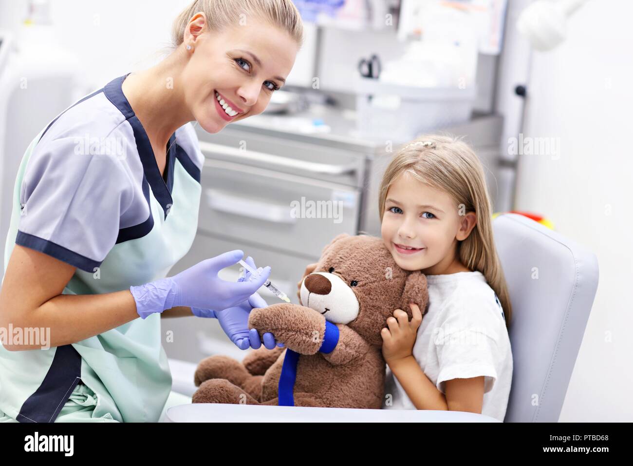 Picture of brave little girl having blood collection for tests Stock ...