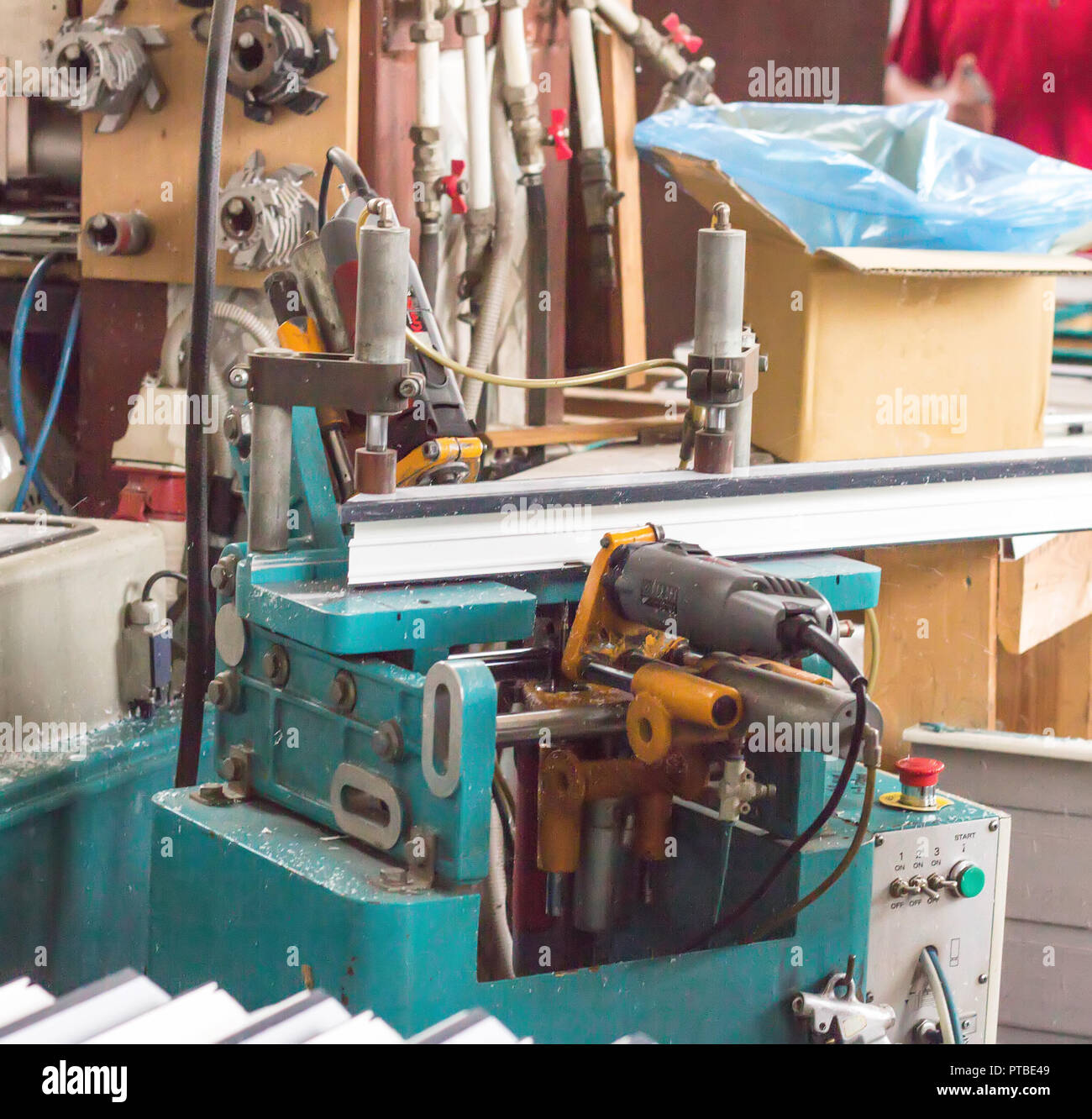 Production of PVC windows, a machine for drilling holes in the frame ...