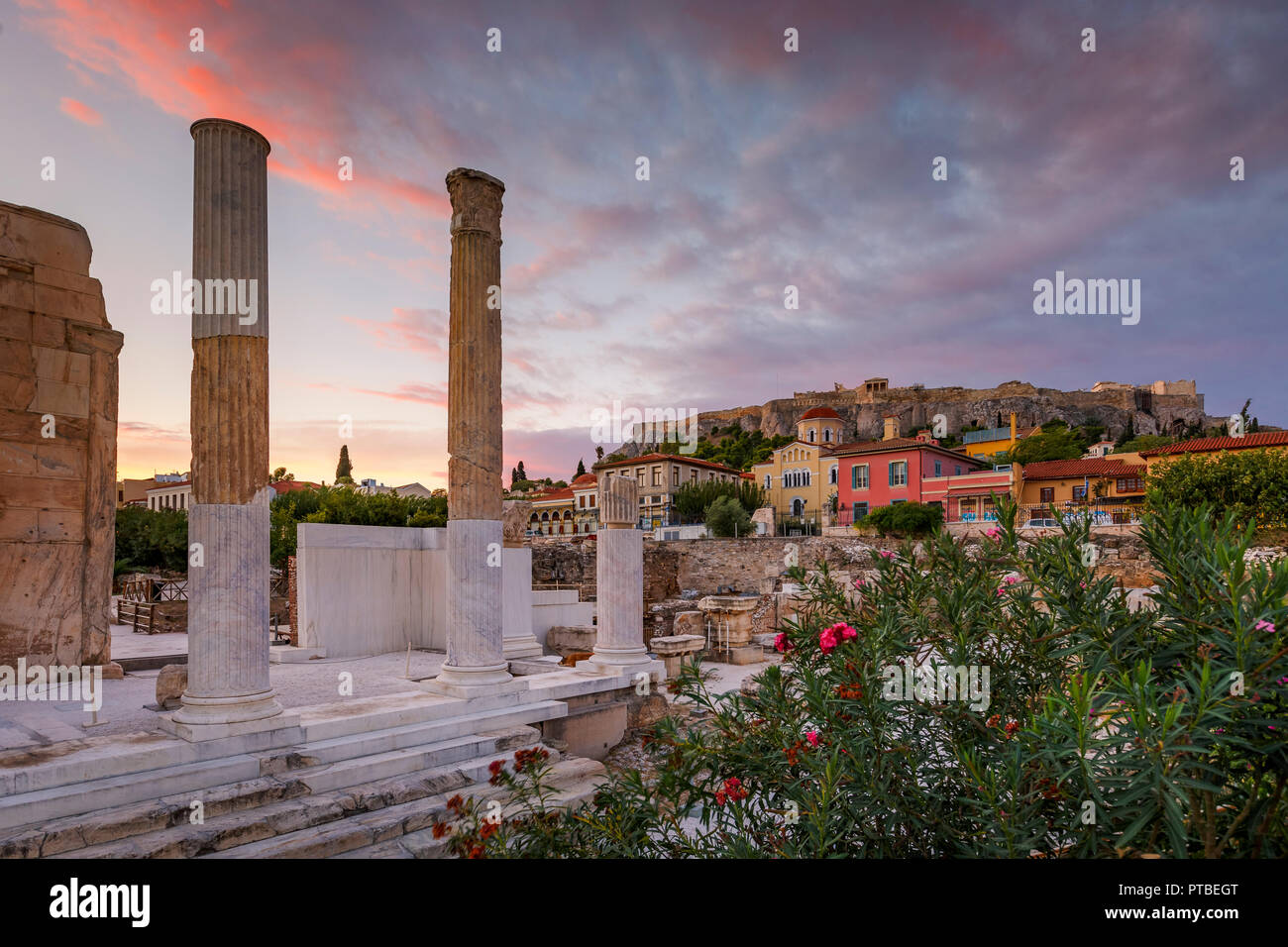 Remains of Hadrian's Library and Acropolis in the old town of Athens ...