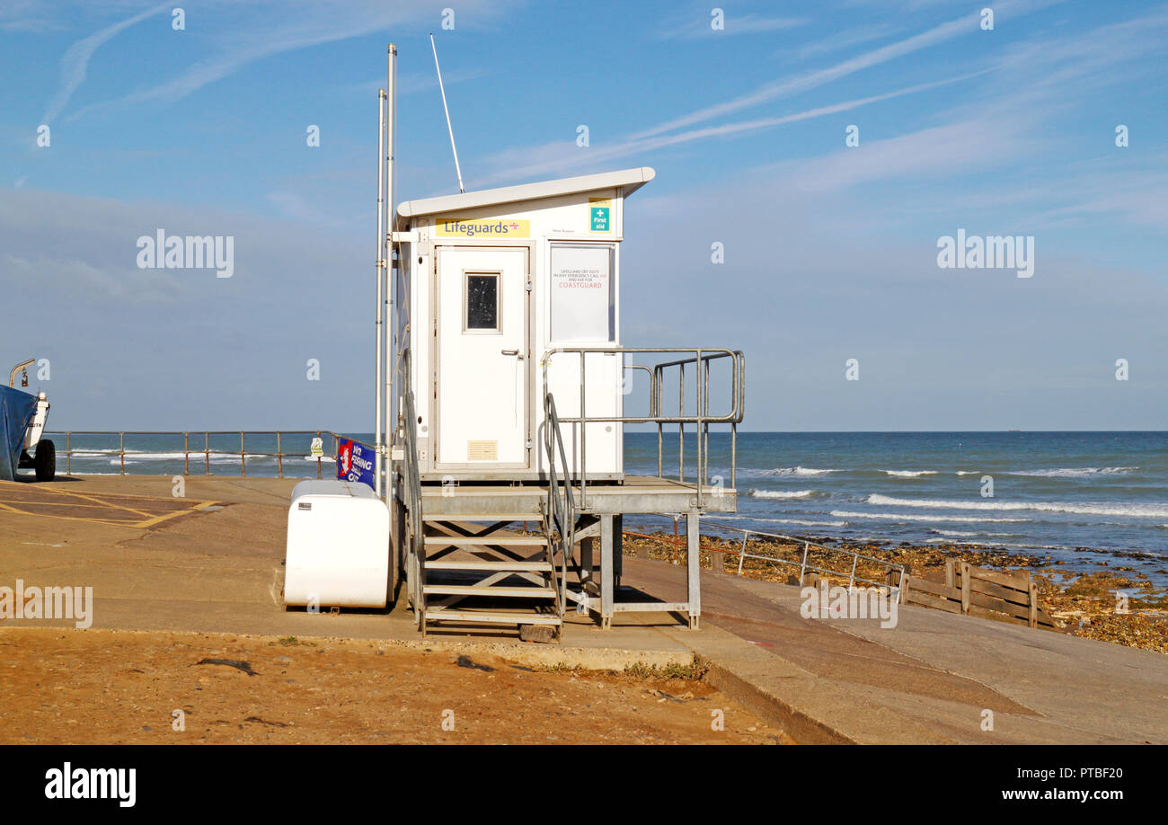 The RNLI Lifeguards hut on the seawall in North Norfolk at West Runton ...
