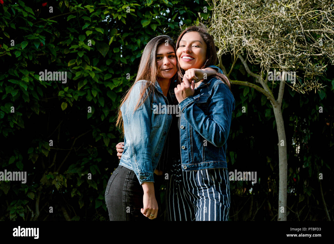 Outdoor lifestyle portrait of two best friends, smiling and having fun ...